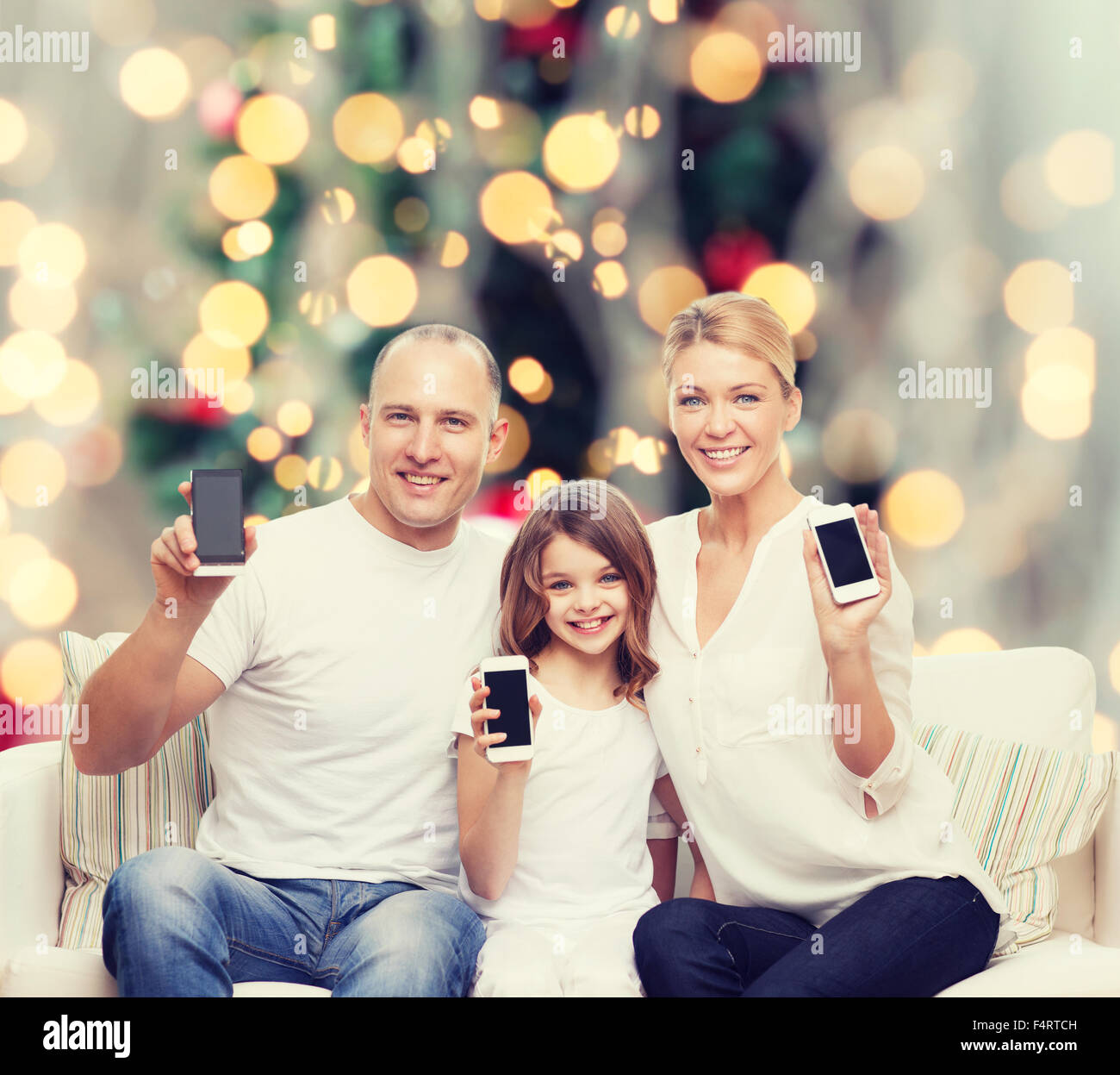 happy family with smartphones Stock Photo - Alamy