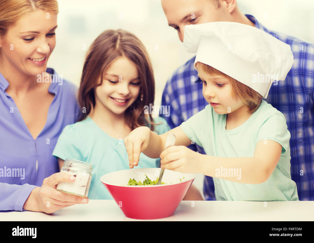 happy family with two kids eating at home Stock Photo - Alamy