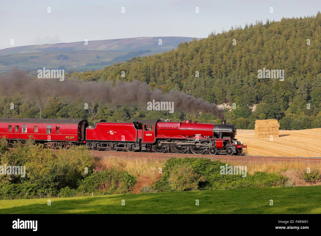 Steam locomotive passing harvested barley field Low Baron Wood Farm ...