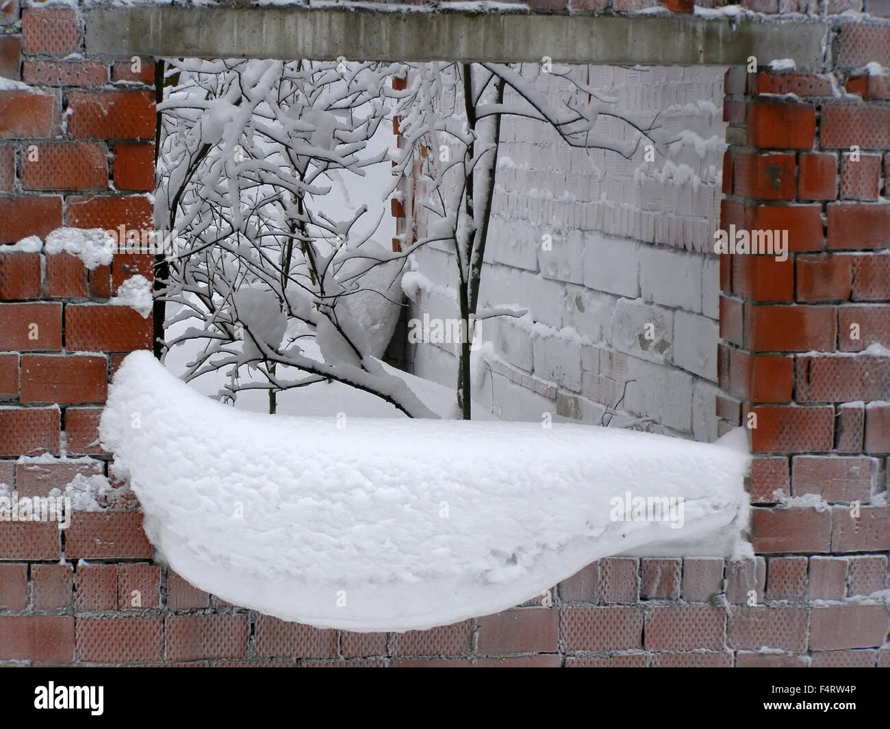 Window with a window sill from a snow cap Stock Photo - Alamy