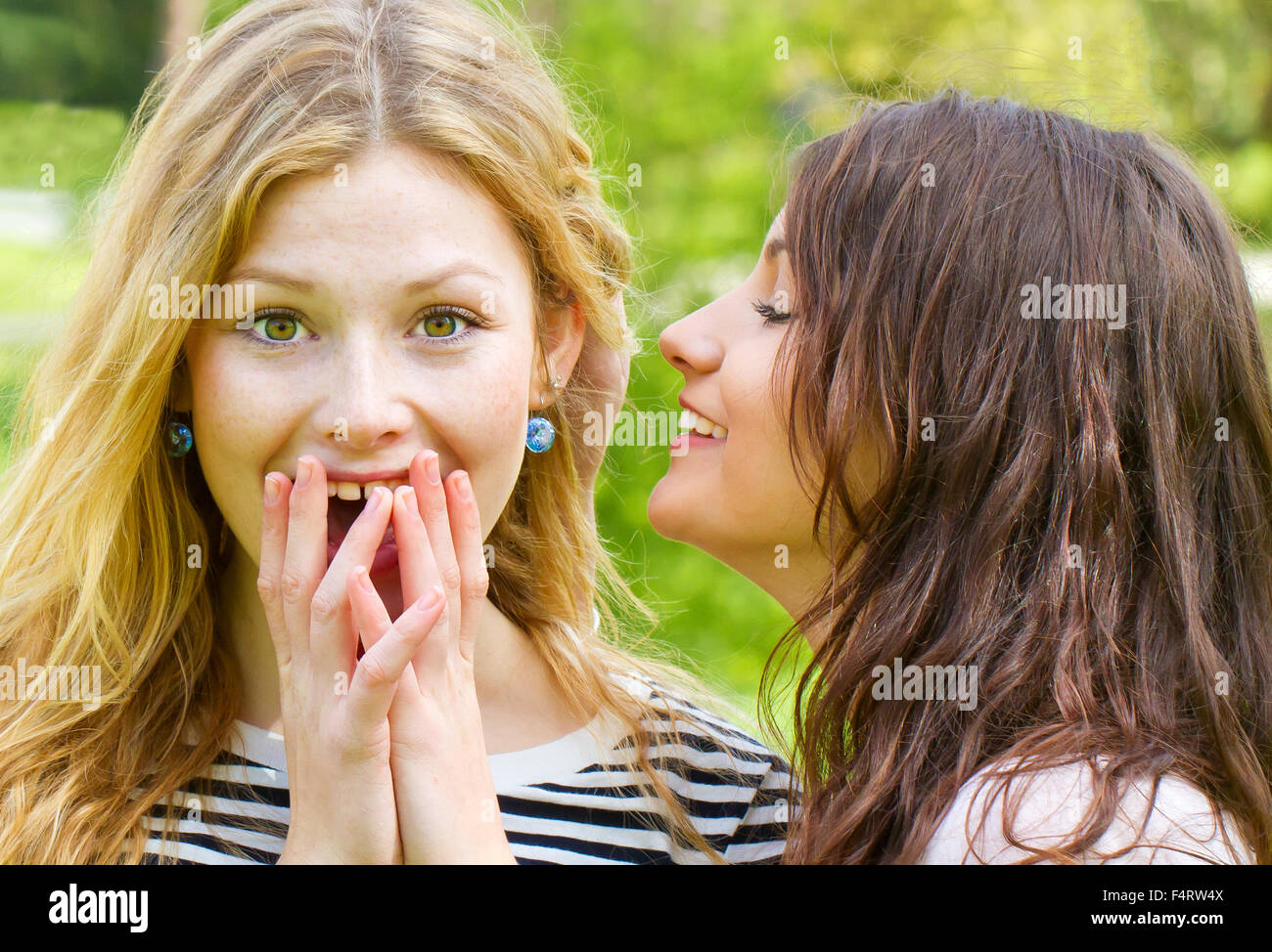 Girls whisper hi-res stock photography and images - Alamy
