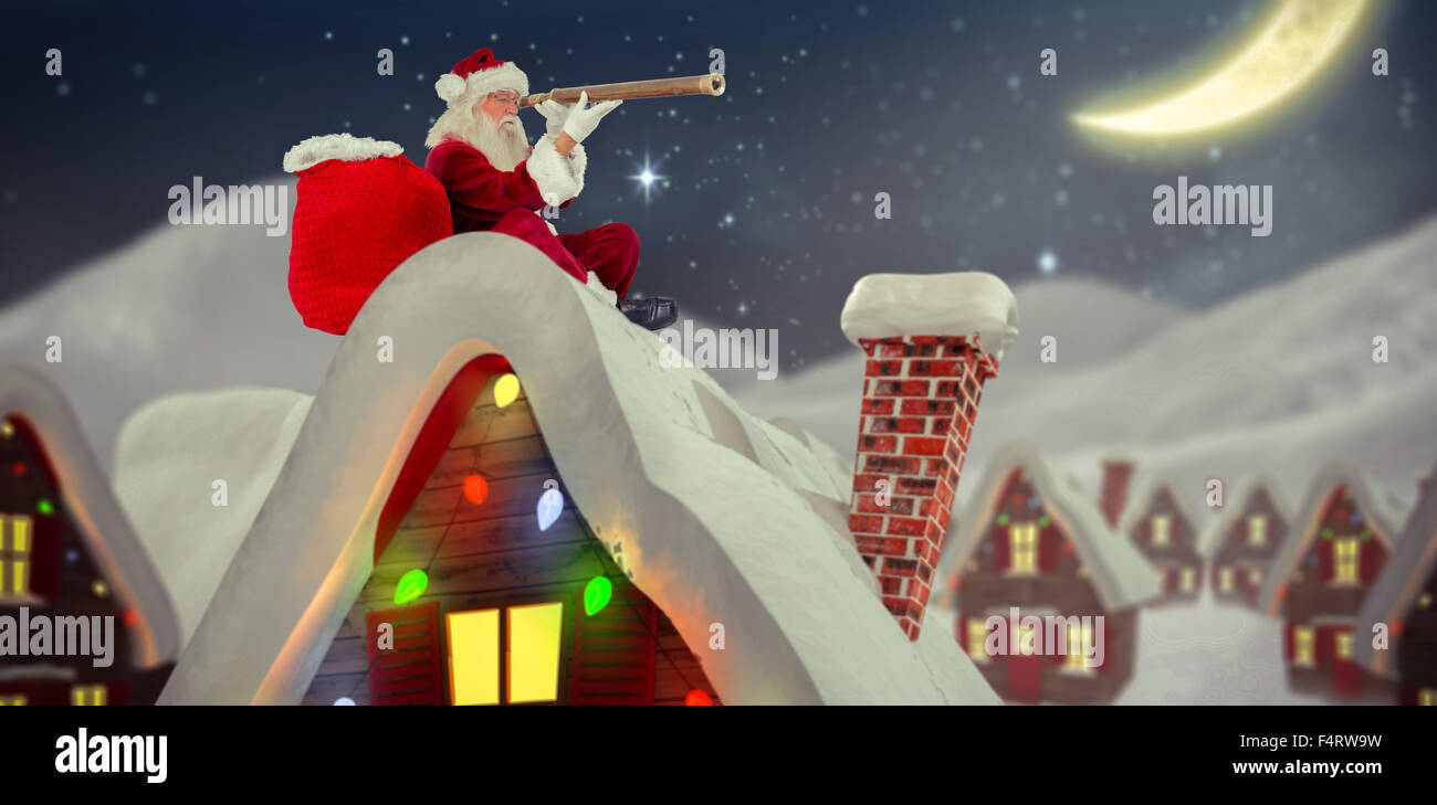 Santa delivery presents to village Stock Photo - Alamy