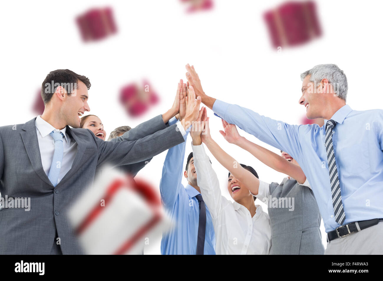 Composite image of business people doing hands checks Stock Photo - Alamy