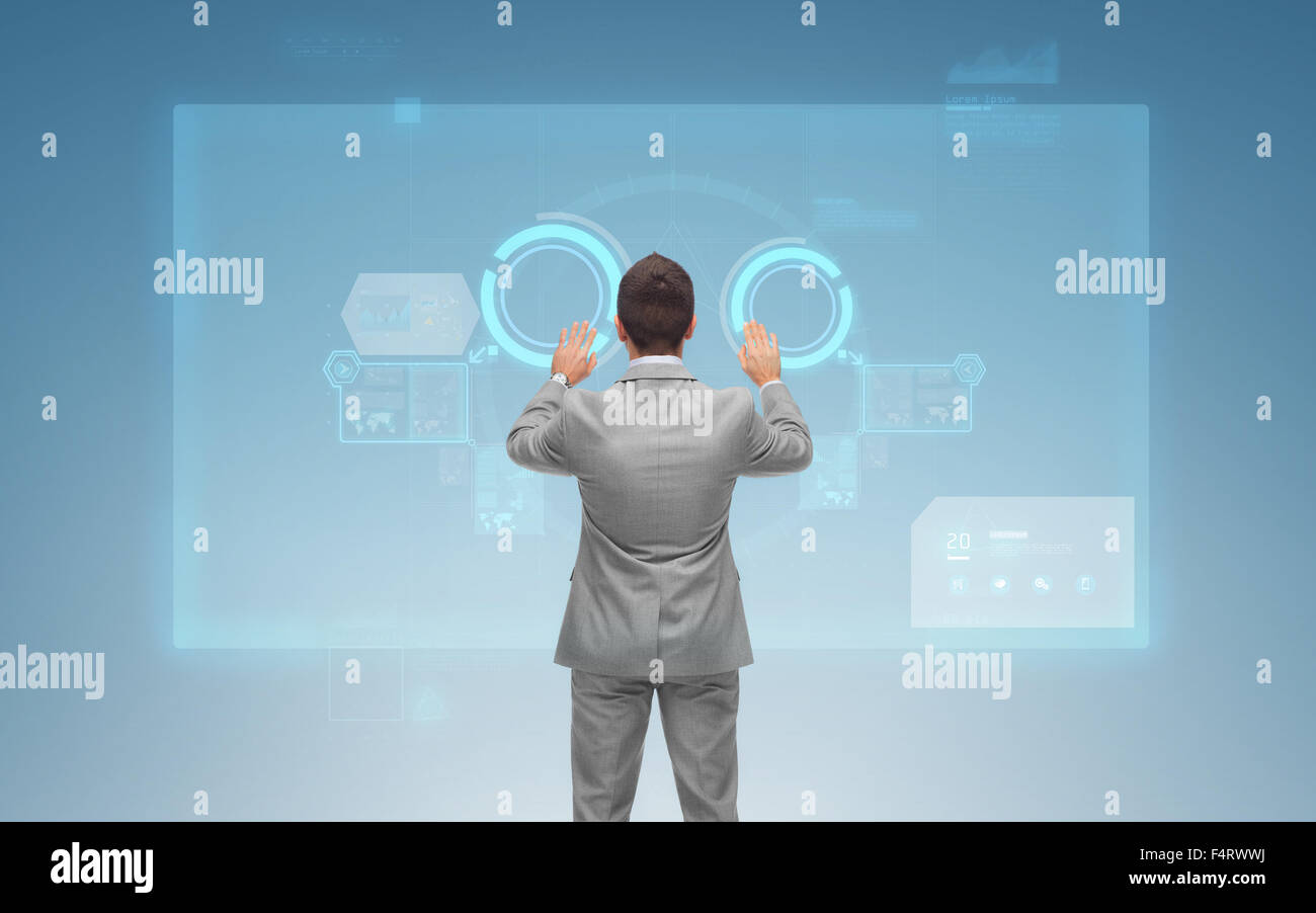 businessman working with virtual screens Stock Photo - Alamy
