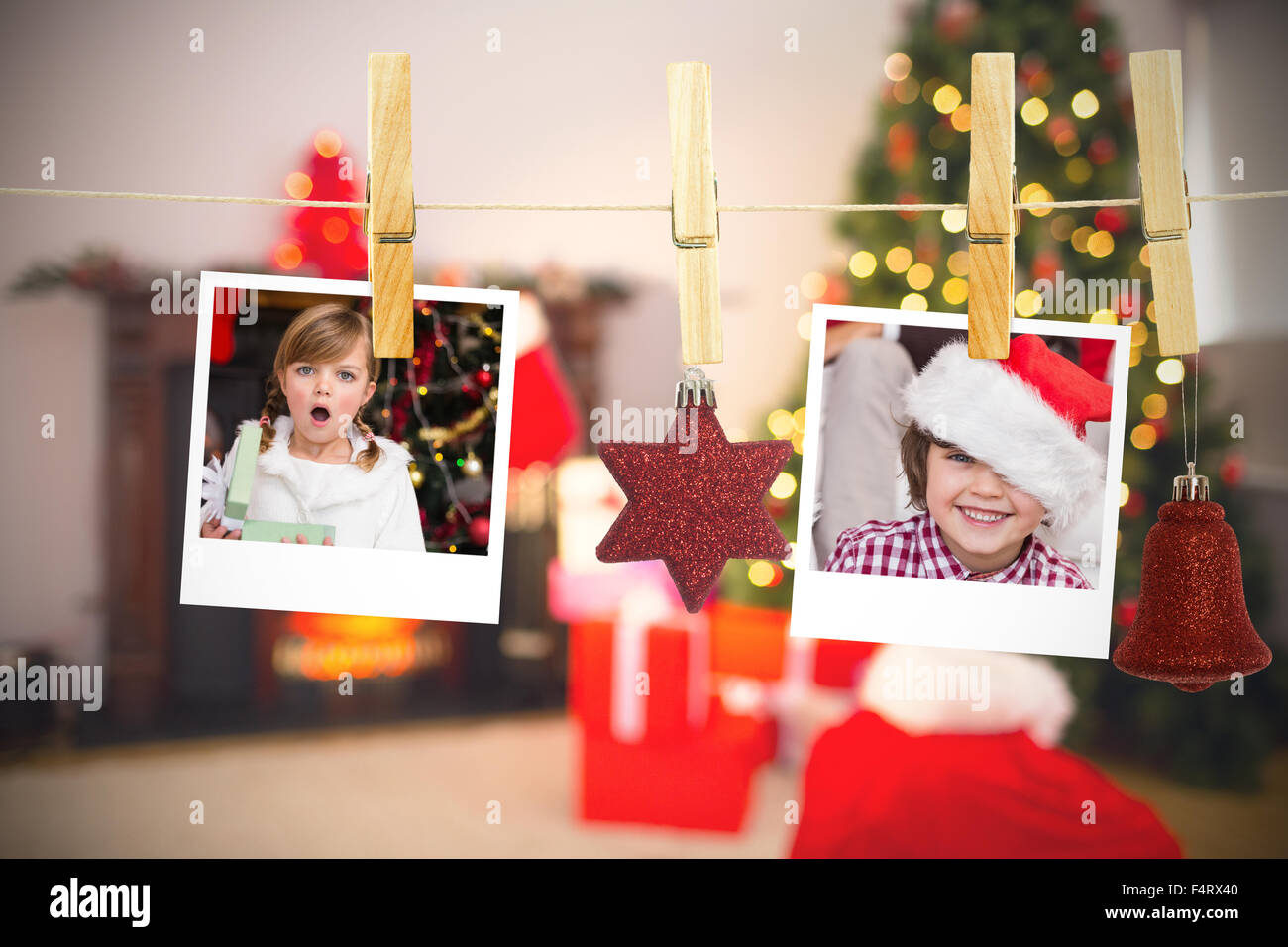Girl hanging christmas decorations hi-res stock photography and images ...