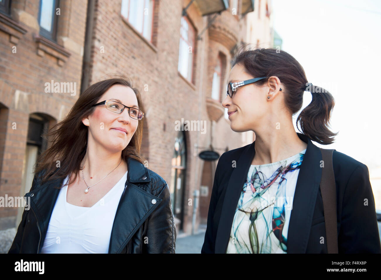 Sweden, Vastergotland, Goteborg, Friends walking Stock Photo - Alamy
