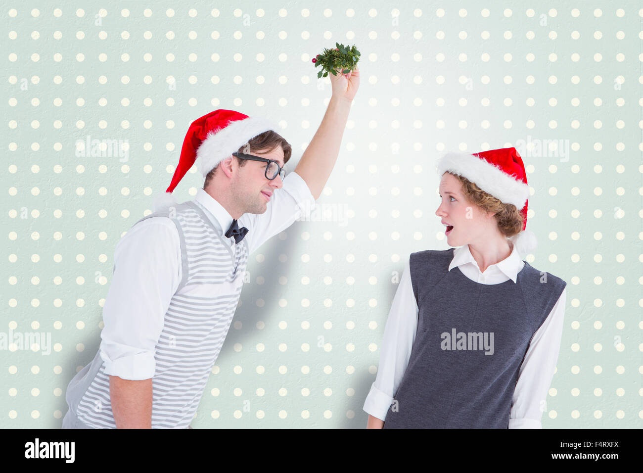 Woman kissing man mistletoe hi-res stock photography and images - Alamy