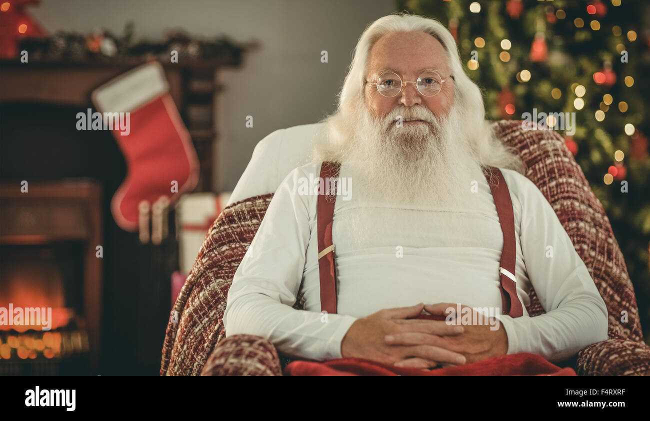Happy santa without his jacket Stock Photo - Alamy