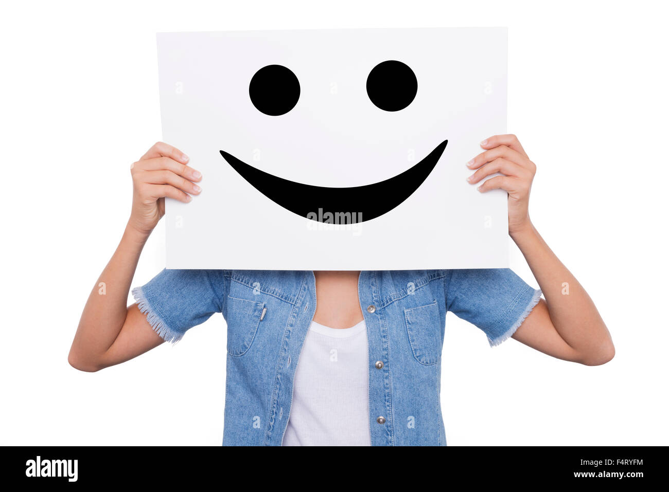 Blonde Girl holding a placard with a smiling smiles front of her face ...