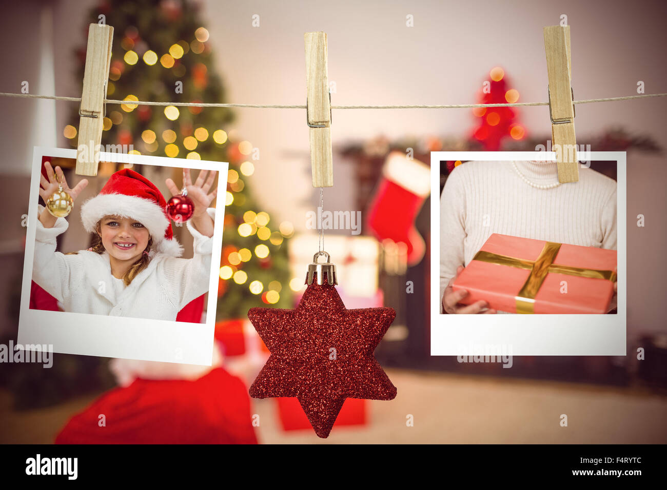 Girl hanging christmas decorations hi-res stock photography and images ...