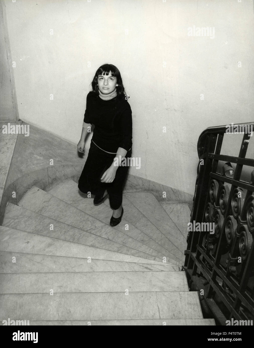 Aspiring actress Ivana Ferri climbs the stairs of the Athena Film ...