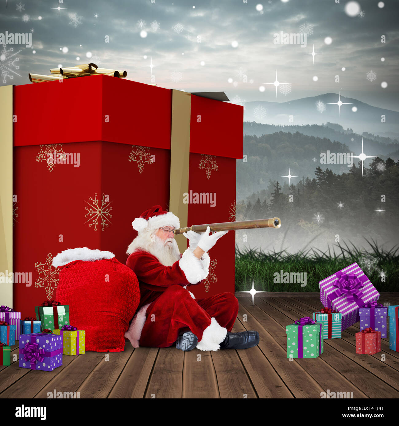 Composite image of santa looking through a telescope Stock Photo - Alamy