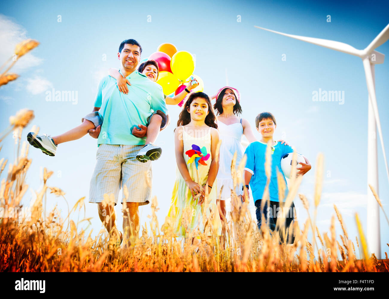 Family Playing Outdoors Children Field Concept Stock Photo - Alamy