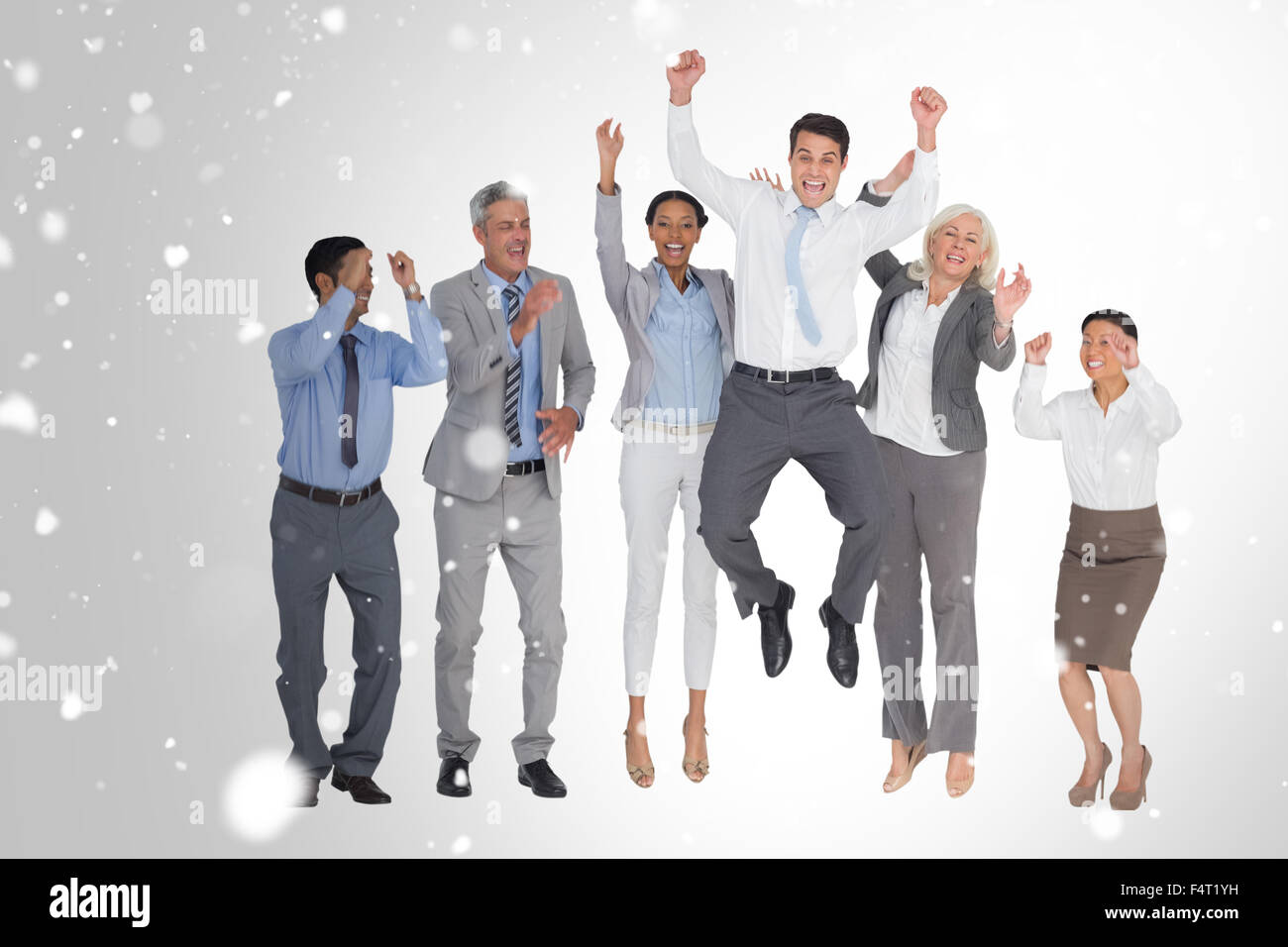 Composite image of business people cheering in office Stock Photo - Alamy