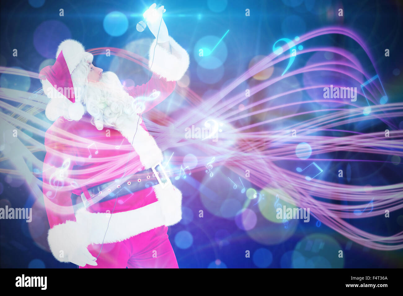 Happy santa claus singing microphone hi-res stock photography and ...