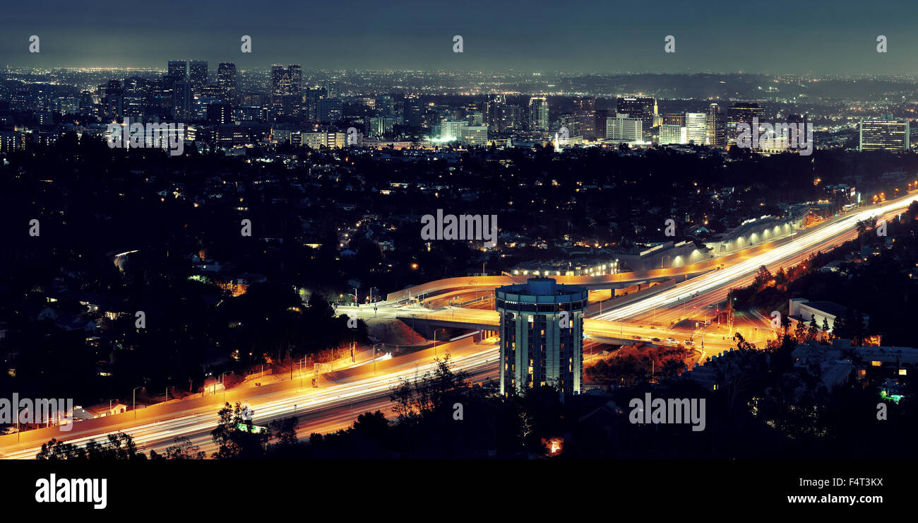 Los Angeles at night with urban buildings and highway Stock Photo - Alamy