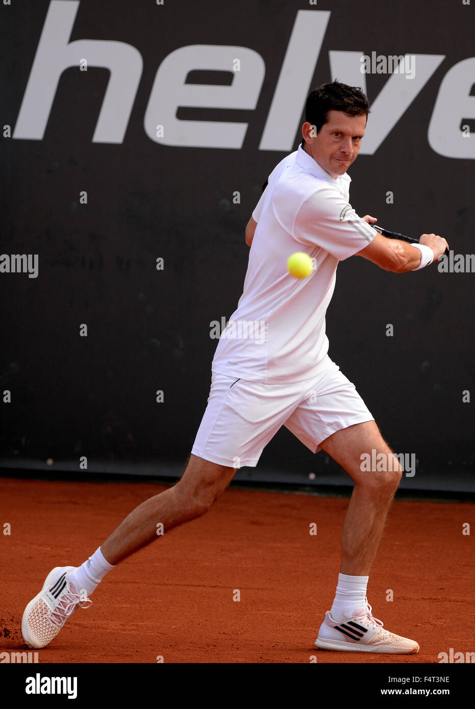 Tim Henman, former professional tennis player playing a match in the ...