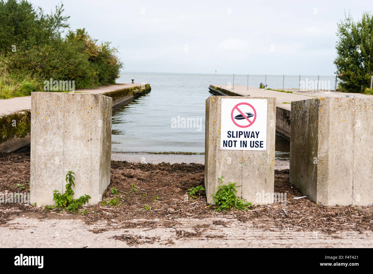 Concrete blocks prevent a slipway being used Stock Photo - Alamy