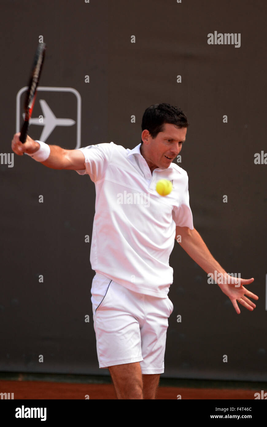 Tim Henman, former professional tennis player playing a match in the ...