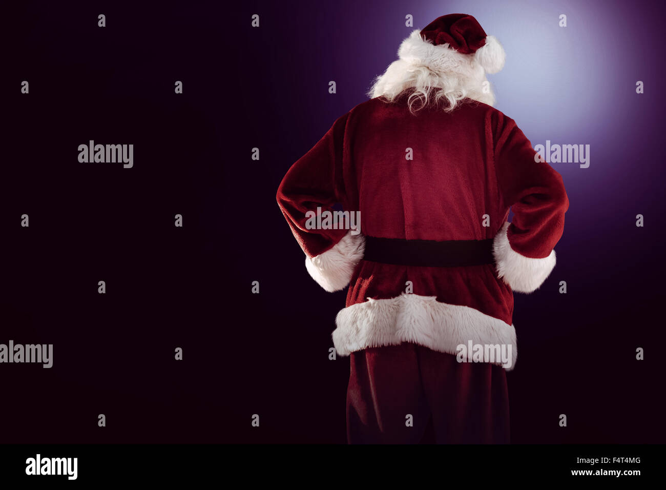 Rear view of father christmas Stock Photo - Alamy