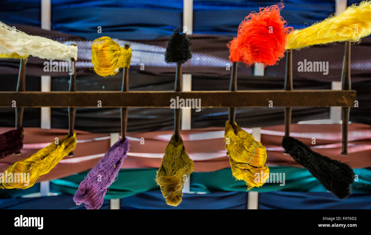 Silk threads hanging from the ceiling Stock Photo - Alamy