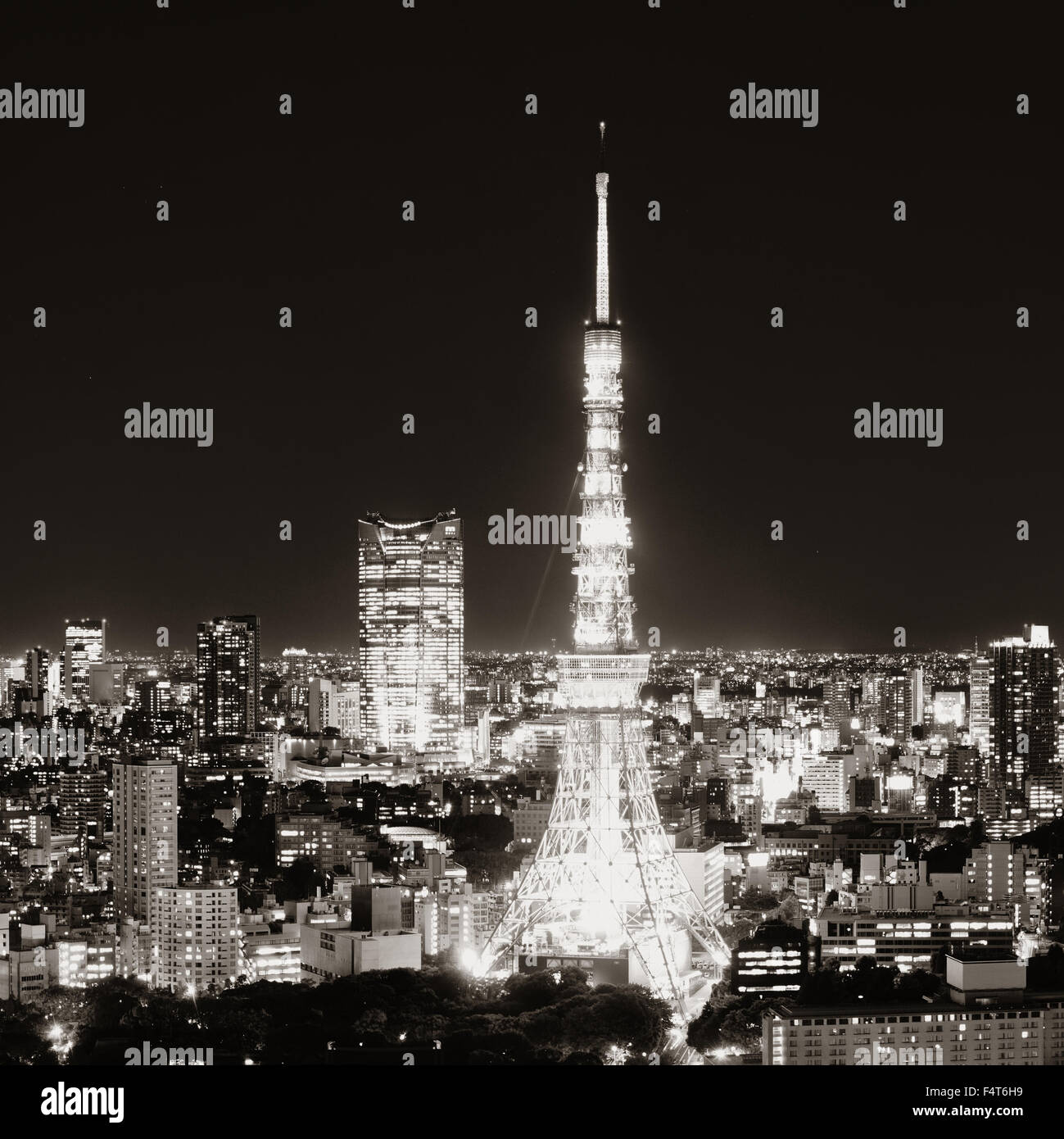 Tokyo Tower and urban skyline rooftop view at night, Japan Stock Photo ...