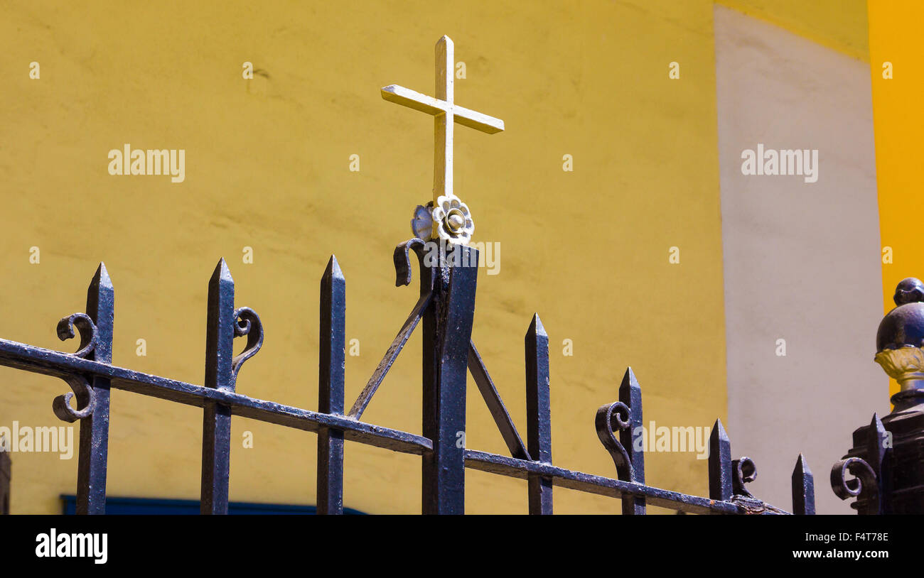 Christian cross on iron fence Stock Photo - Alamy
