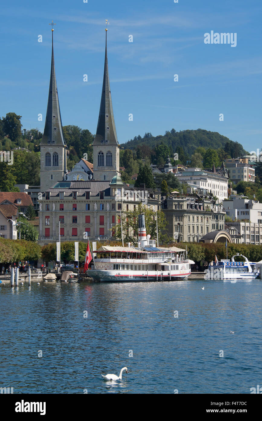 Twin spires church of St. Leodegar and lakeside quay Lucerne ...