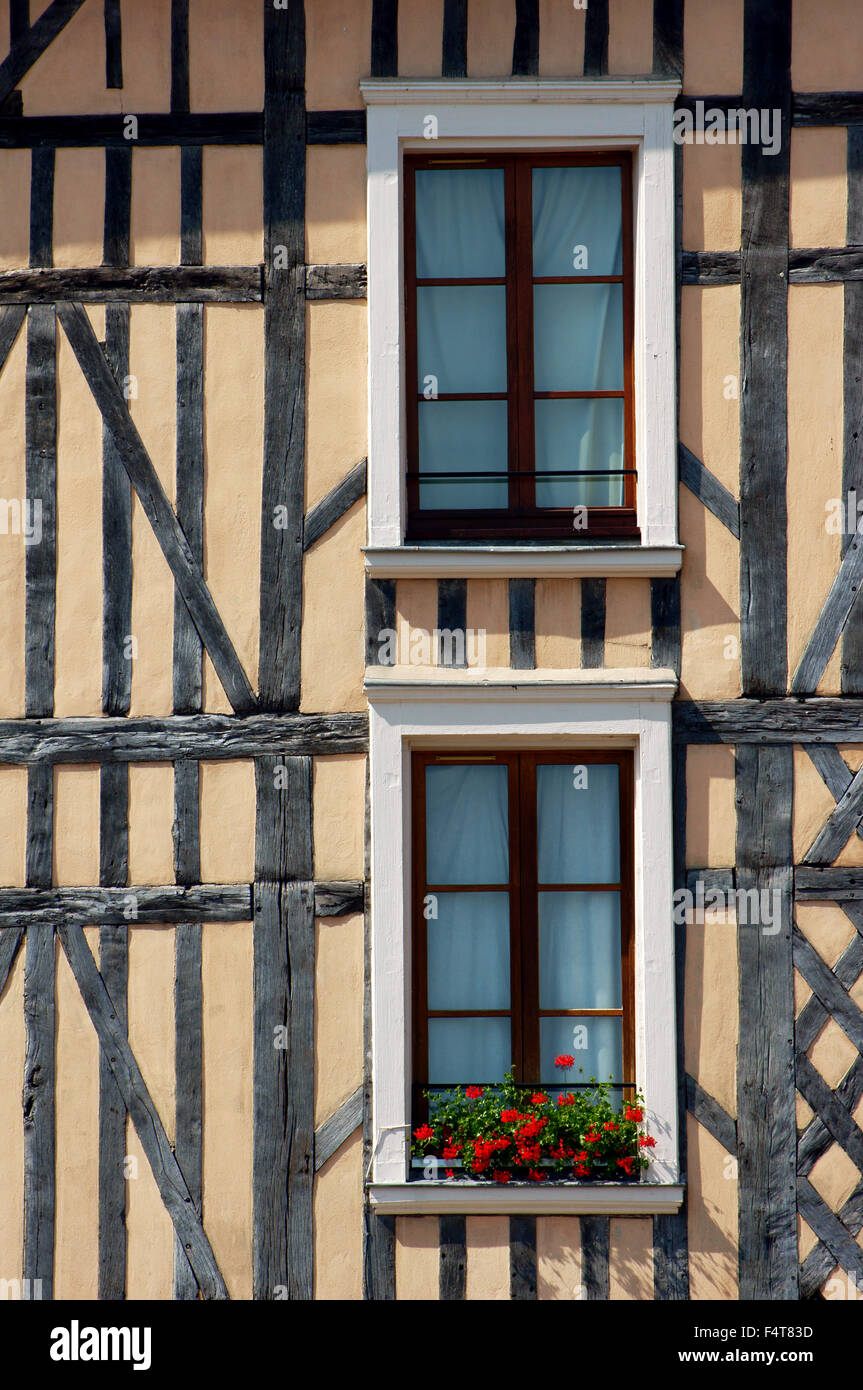 windows in tenement house- the old city of Troyes, France Stock Photo ...