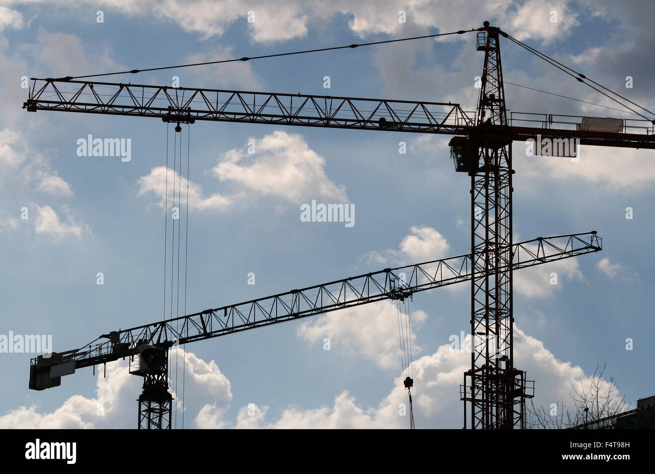 Construction site with two tower cranes hi-res stock photography and ...