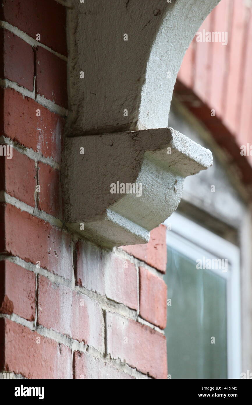 Arch extending from a brick wall Stock Photo - Alamy