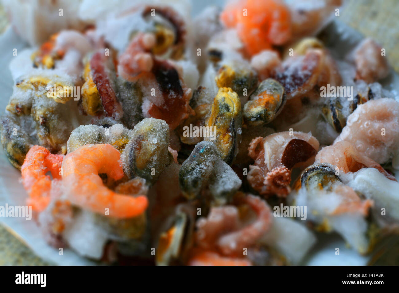 Frozen sea food ingredients with shrimps, clams and octopuses Stock ...