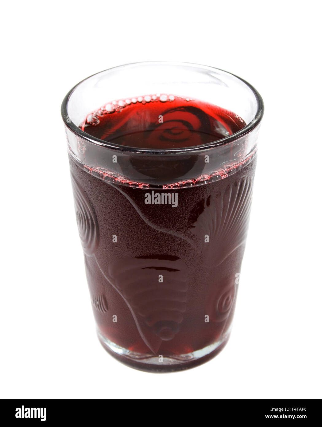 black currant juice in shell adornment glass isolated on white ...