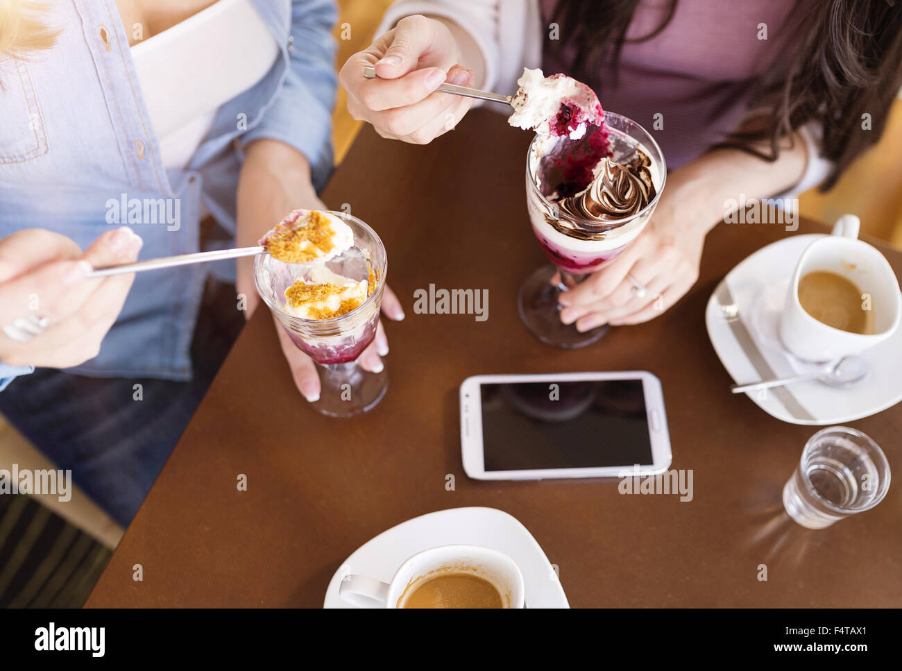 Beautiful women in cafe Stock Photo - Alamy