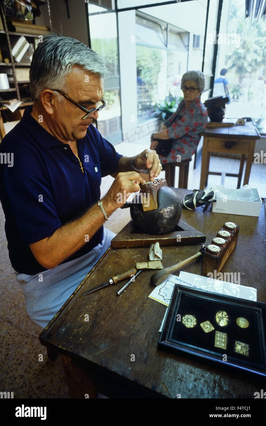 Craftsman in Toledo Spain making Damascene or "Damasquino" jewelry ...