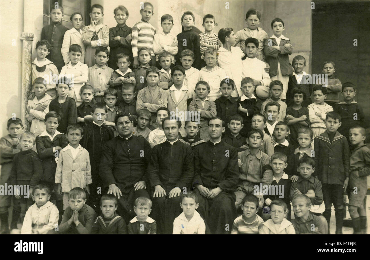 Children and priests hi-res stock photography and images - Alamy