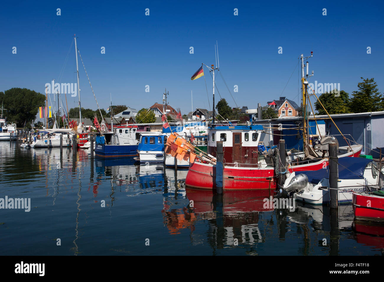 Fishing boats and sail yachts in the Niendorfer harbour, port, Baltic ...