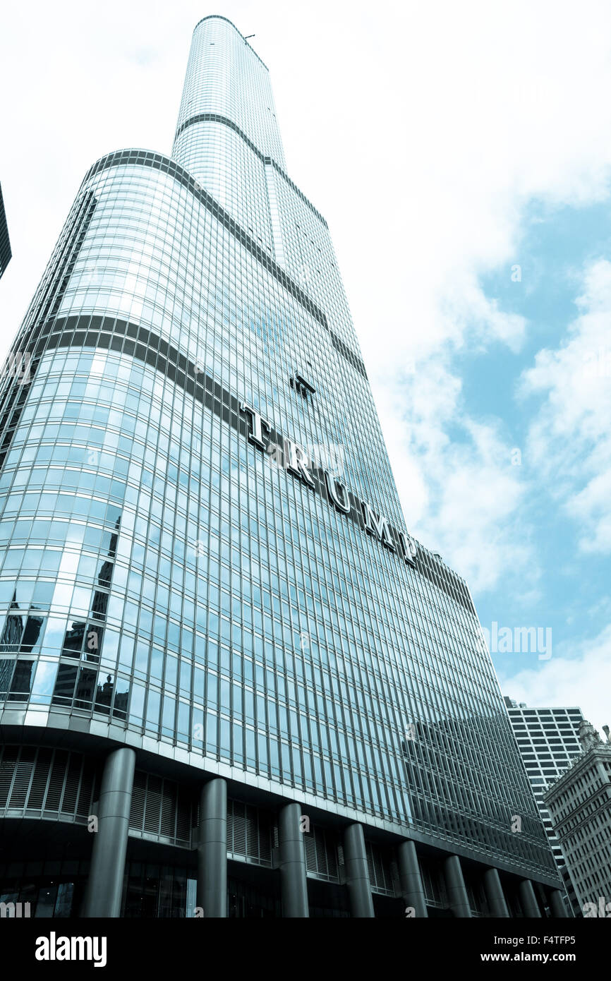 Trump Tower rises above the surrounding buildings, blue glass exterior ...