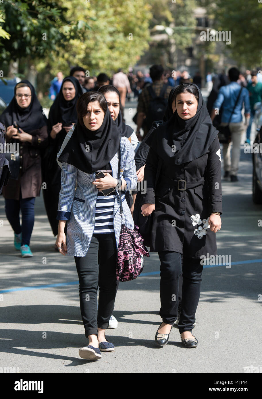 Tehran, Iran. 18th Oct, 2015. Female students walk across the campus of ...