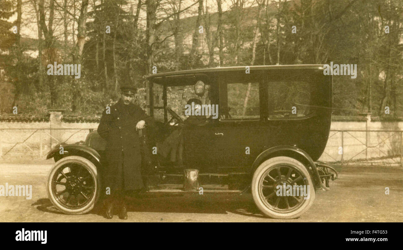 Lady in a car with driver Stock Photo - Alamy