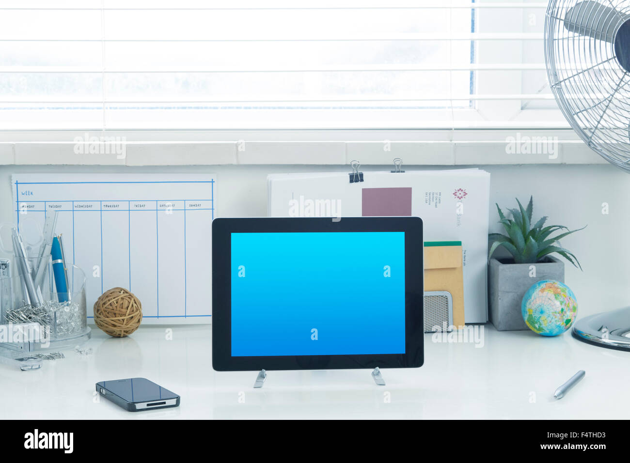 Home and Business office interior set up with a mobile phone and tablet ...