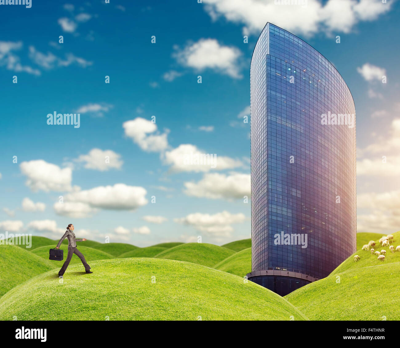 Woman running to the building Stock Photo - Alamy
