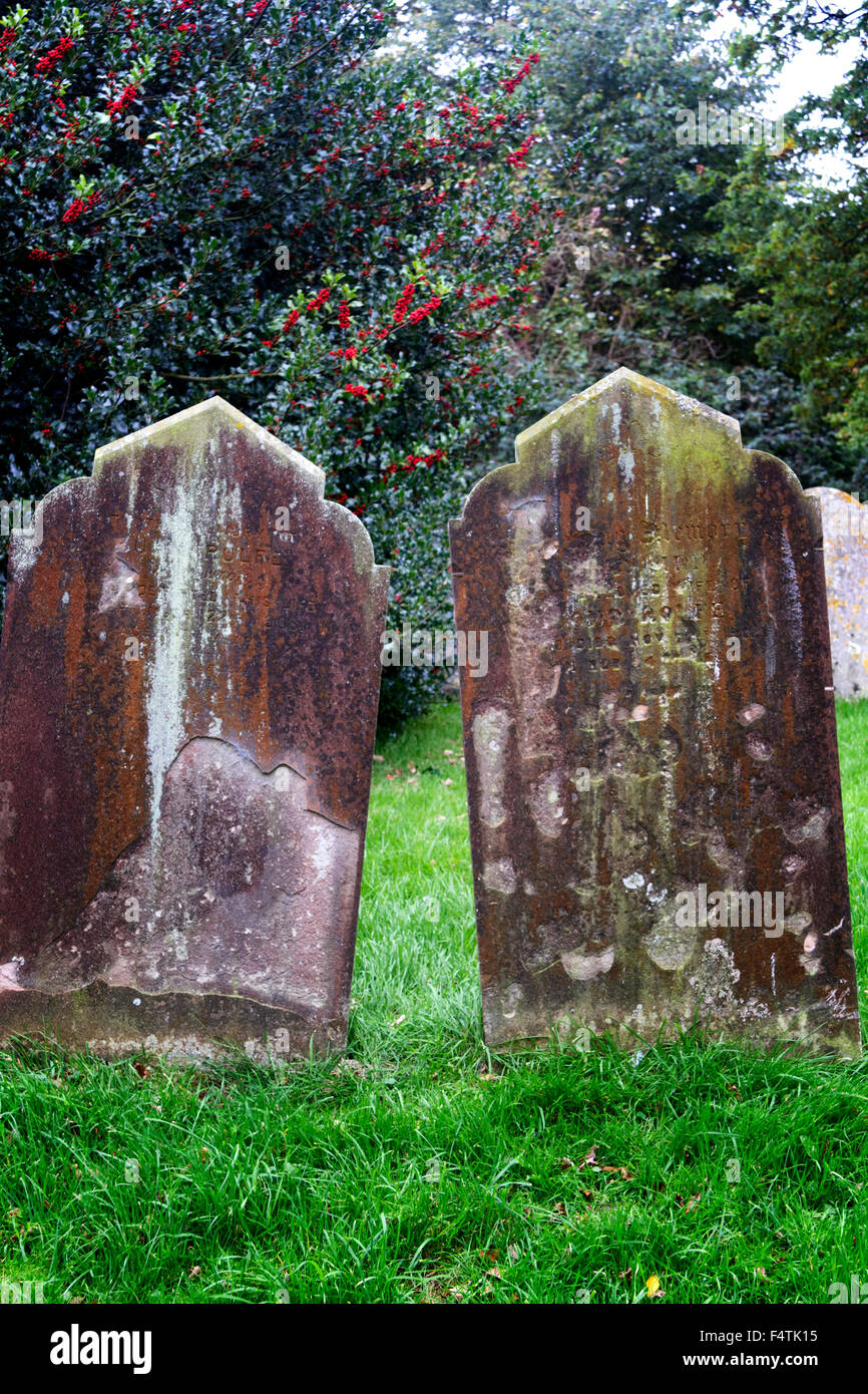 Ancient grave headstones in an English village churchyard, Suffolk, UK ...