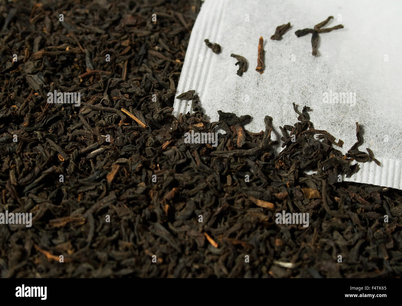 One bag of tea in long leaf tea Stock Photo - Alamy