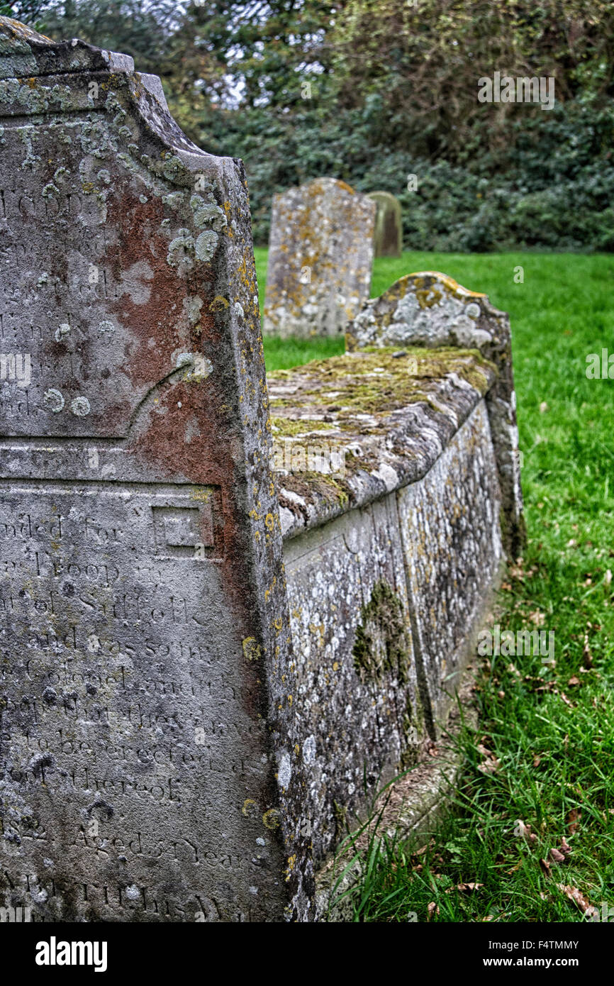 Ancient grave headstones in an English village churchyard, Suffolk, UK ...