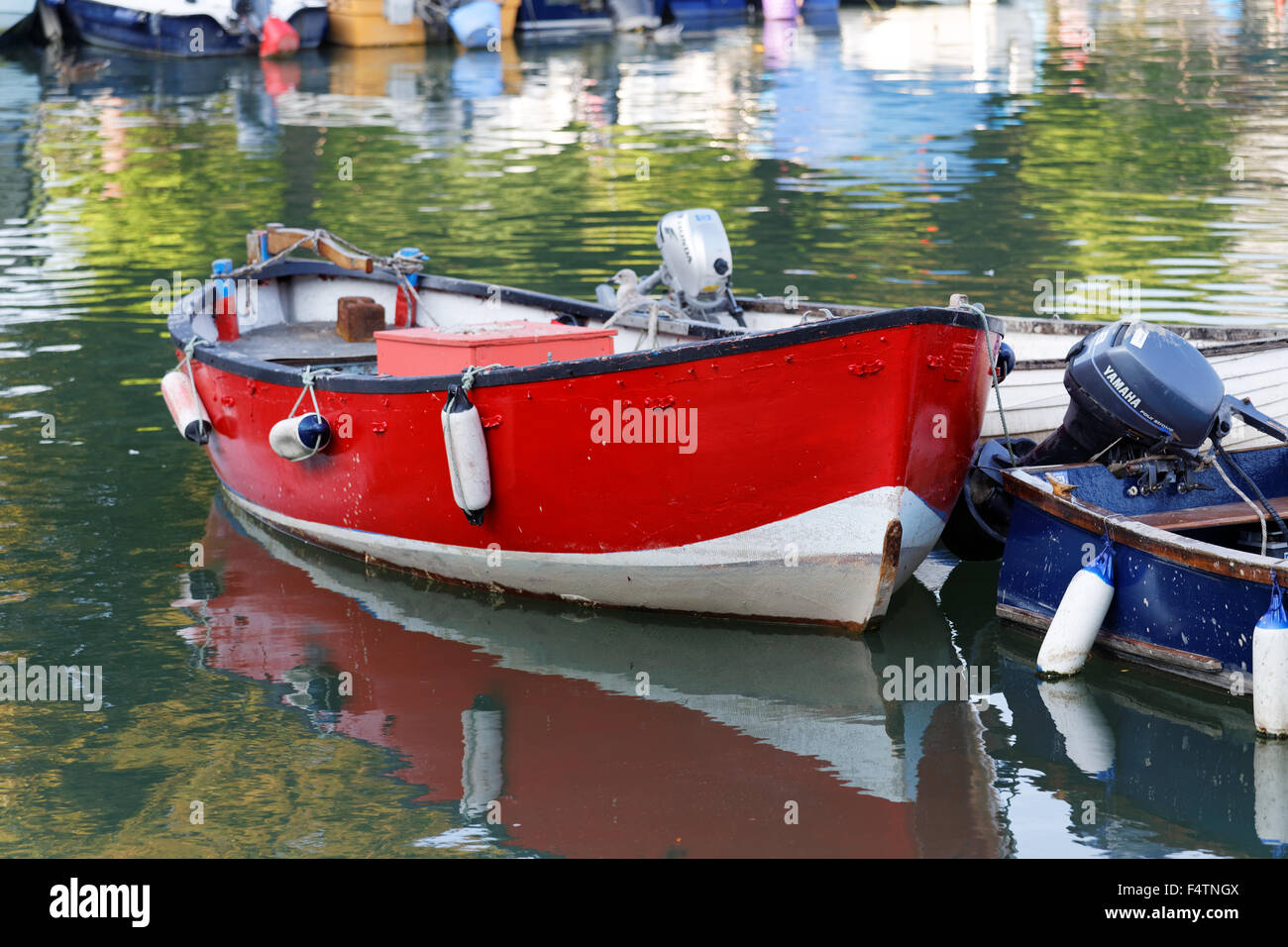 Small Red Wooden Boat at Mooring Stock Photo - Alamy