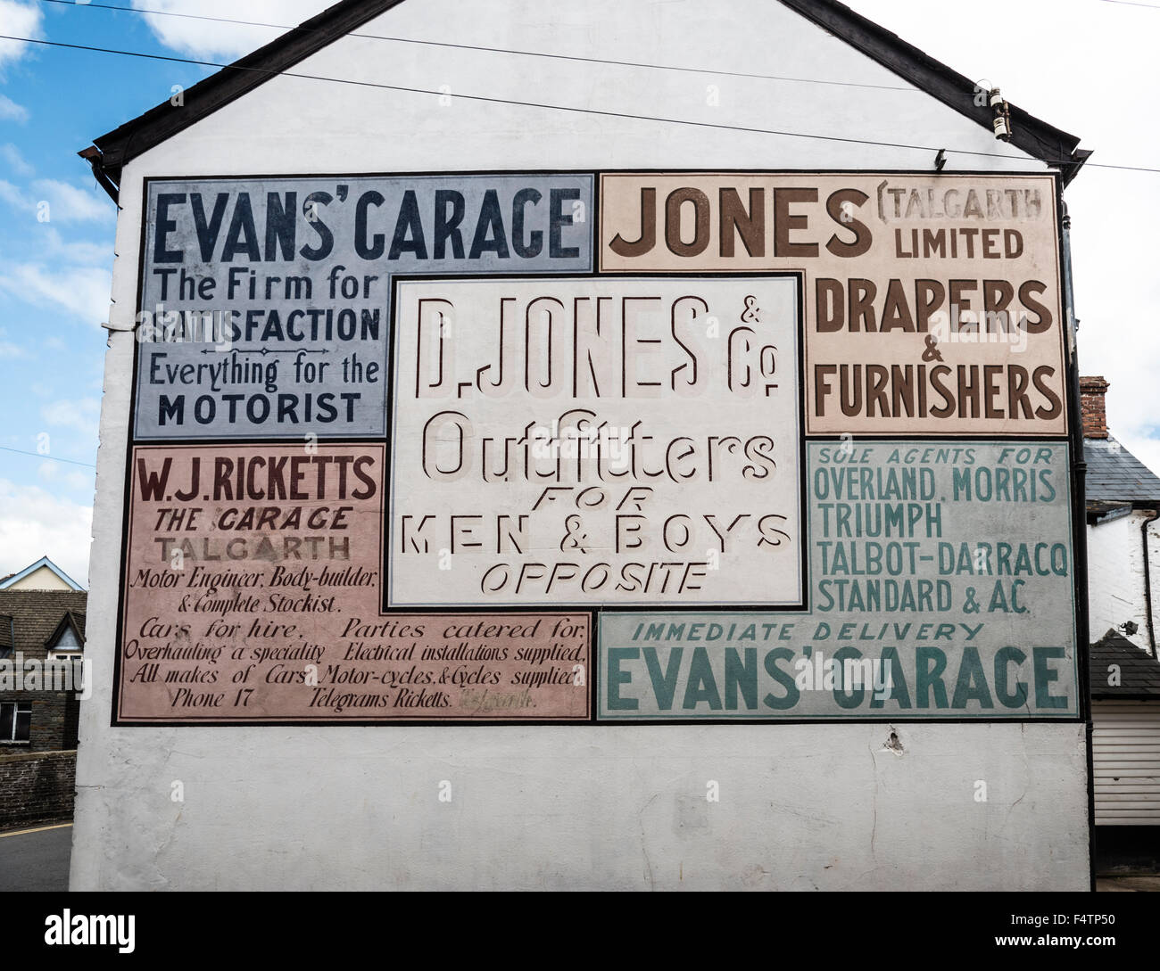 Historical advertising signs at Talgarth, Wales Stock Photo - Alamy