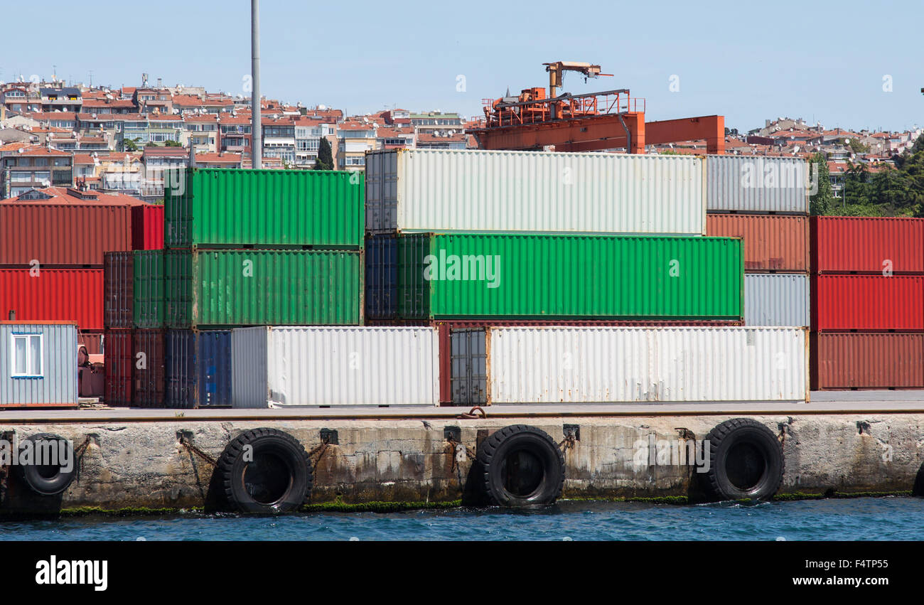 Containers waiting to transfer in a port Stock Photo - Alamy
