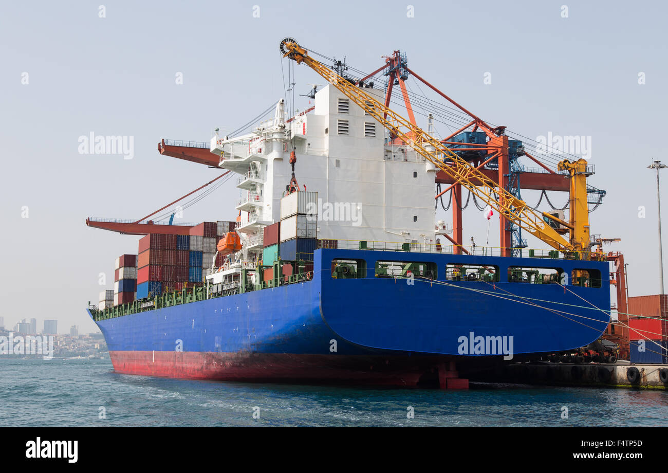 Container Ship is loading in a port Stock Photo - Alamy