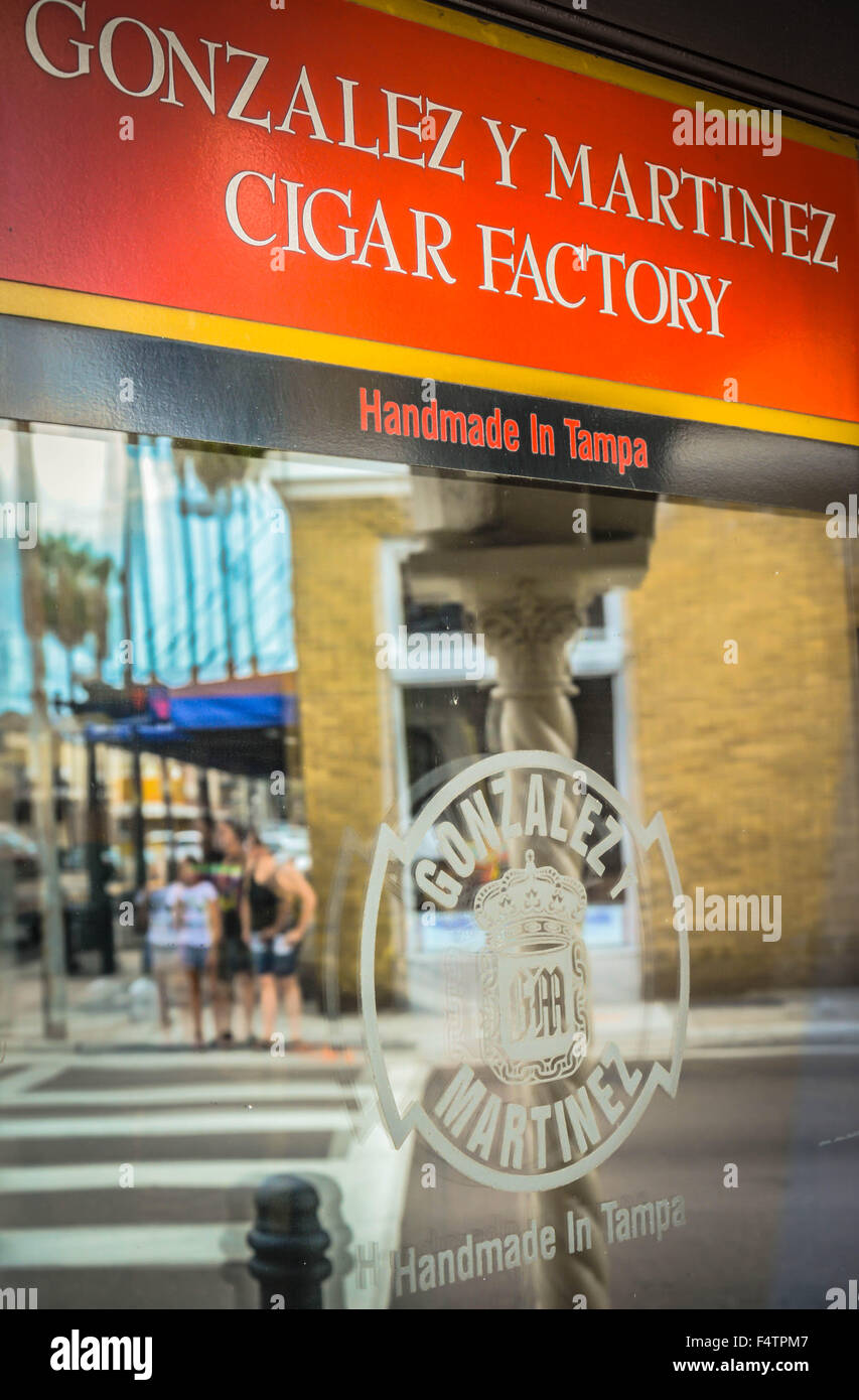 Reflecting storefront window for Gonzales and Martinez Cigar Factory ...